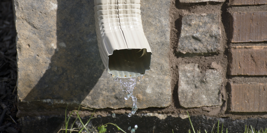 How to Unclog Blocked Downspouts - Michigan Roofing Company